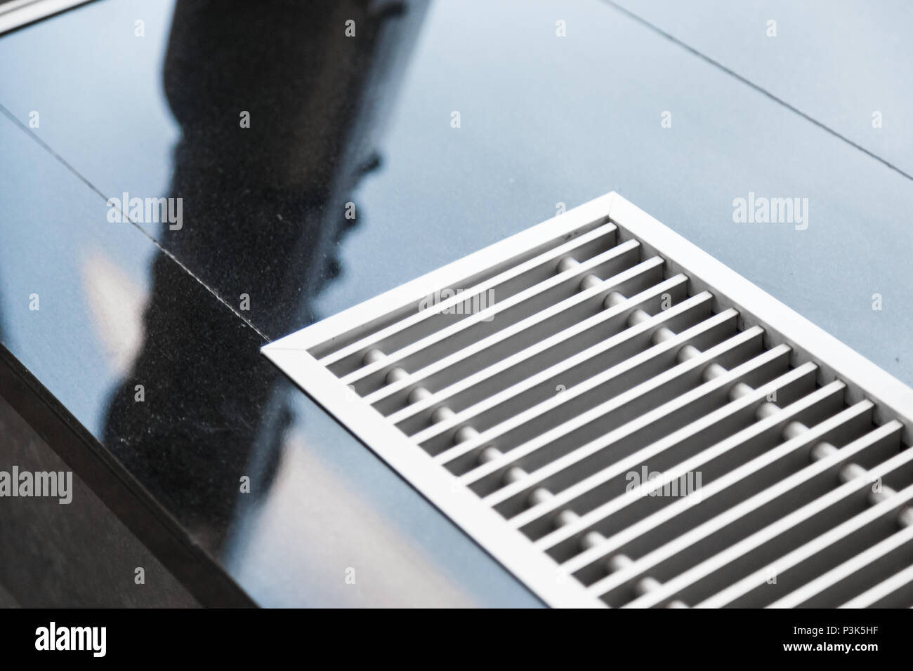 Water heater embedded in floor Stock Photo - Alamy