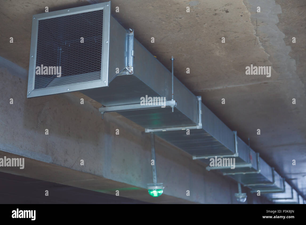 Fire exhauster in a multi-level parking building Stock Photo - Alamy