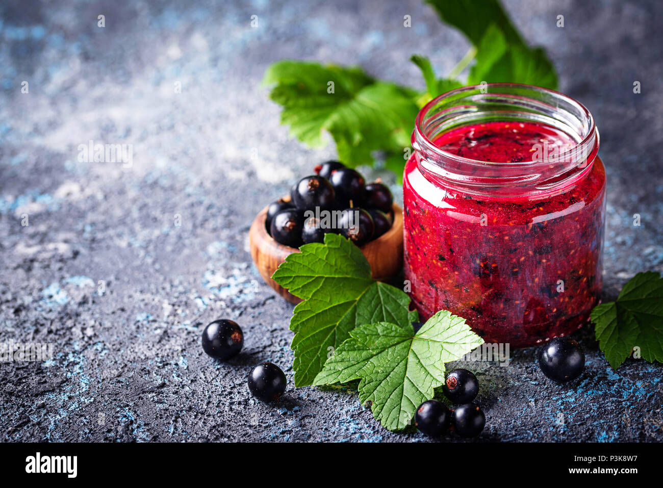 Black currant jam in jar Stock Photo - Alamy