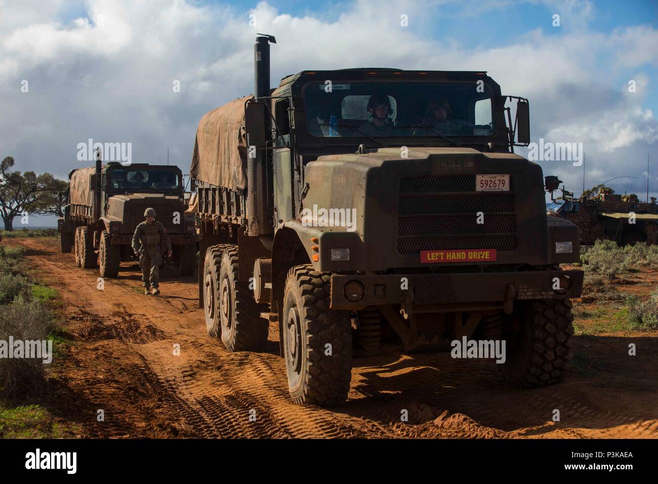 U.S. Marines and Australian Army soldiers move towards their next ...