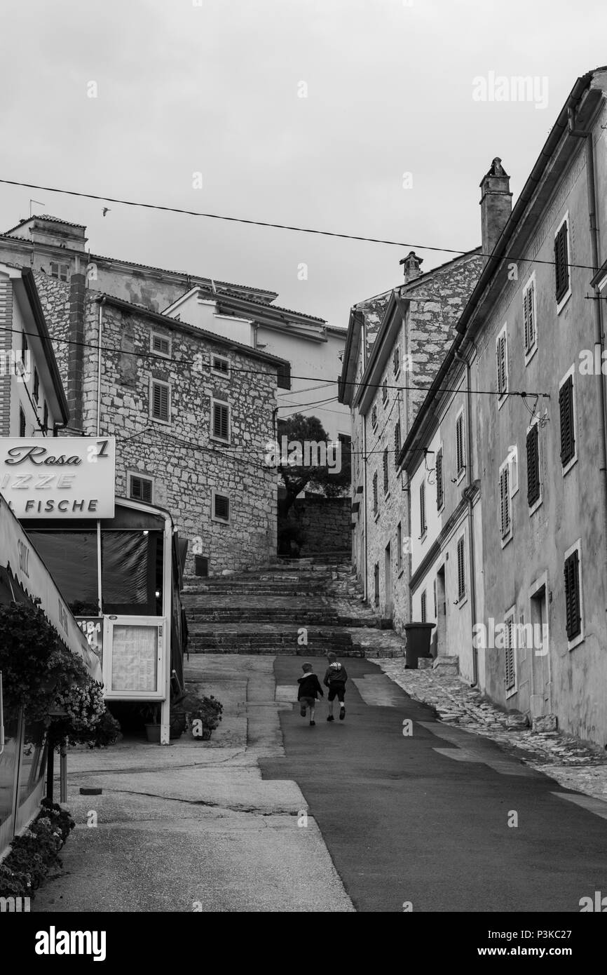 Children playing in residential Black and White Stock Photos & Images ...