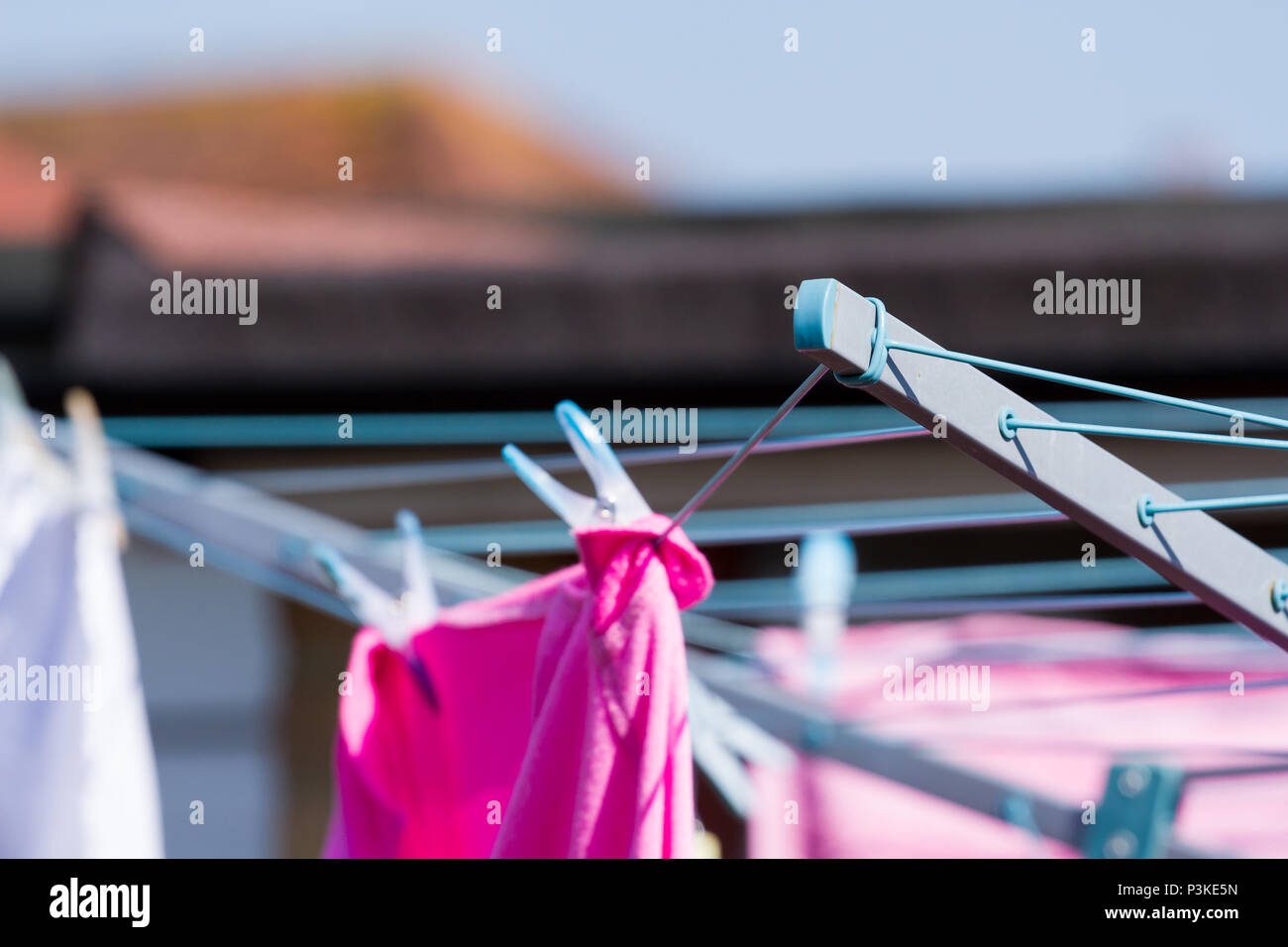 Close up of a rotary washing line Stock Photo - Alamy