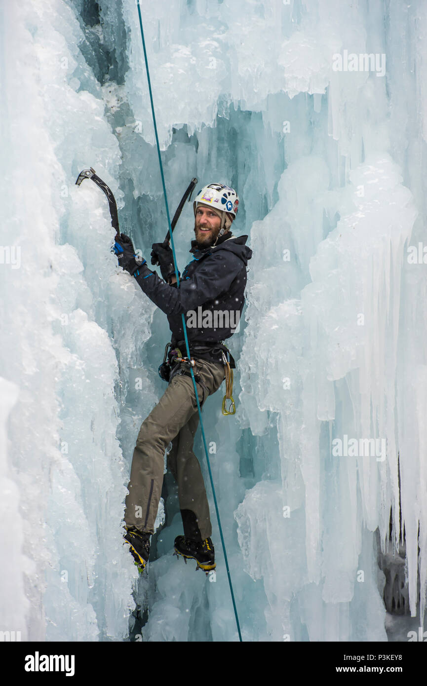 Climber ascending ice wall in Ouray Ice Park, Colorado, USA Stock Photo ...