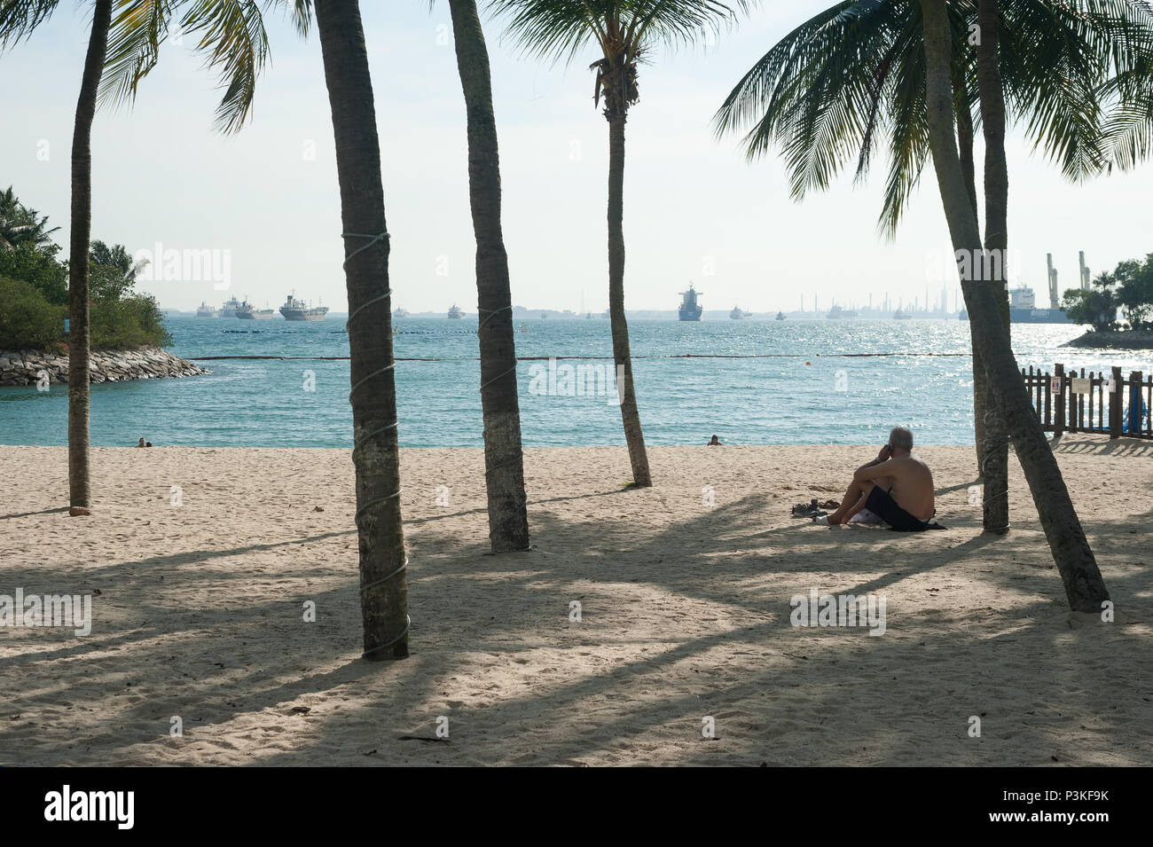 Singapore, Republic of Singapore, Asia, visitors at Tanjong beach on ...