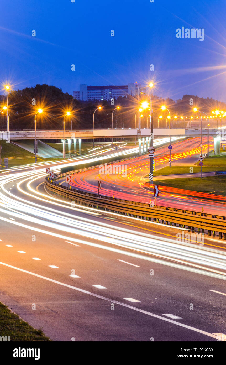 Night Traffic with Light Trails on Highway Interchange. Night City ...