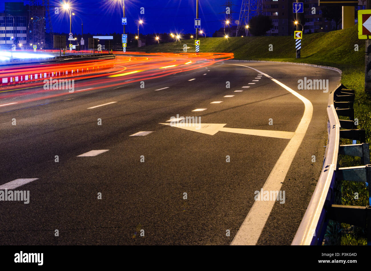 Night Traffic with Light Trails on Highway Interchange. Night City ...