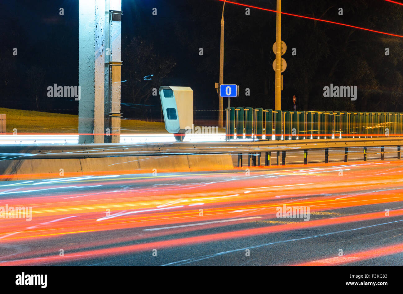 Stationary Car Speed Radar Near a Highway Road. Night Road Traffic ...