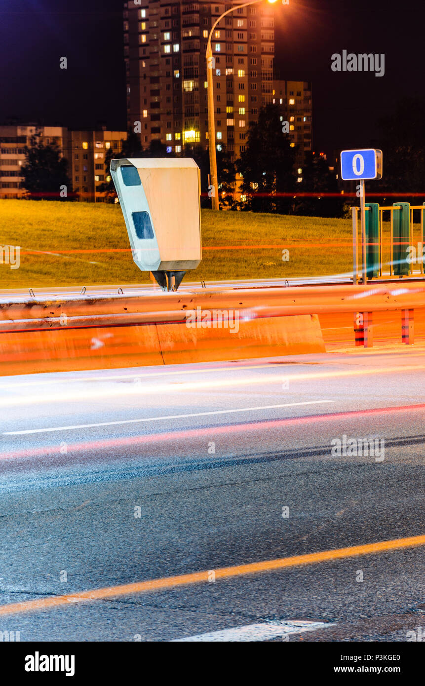 Stationary Car Speed Radar Near a Highway Road. Night Road Traffic ...
