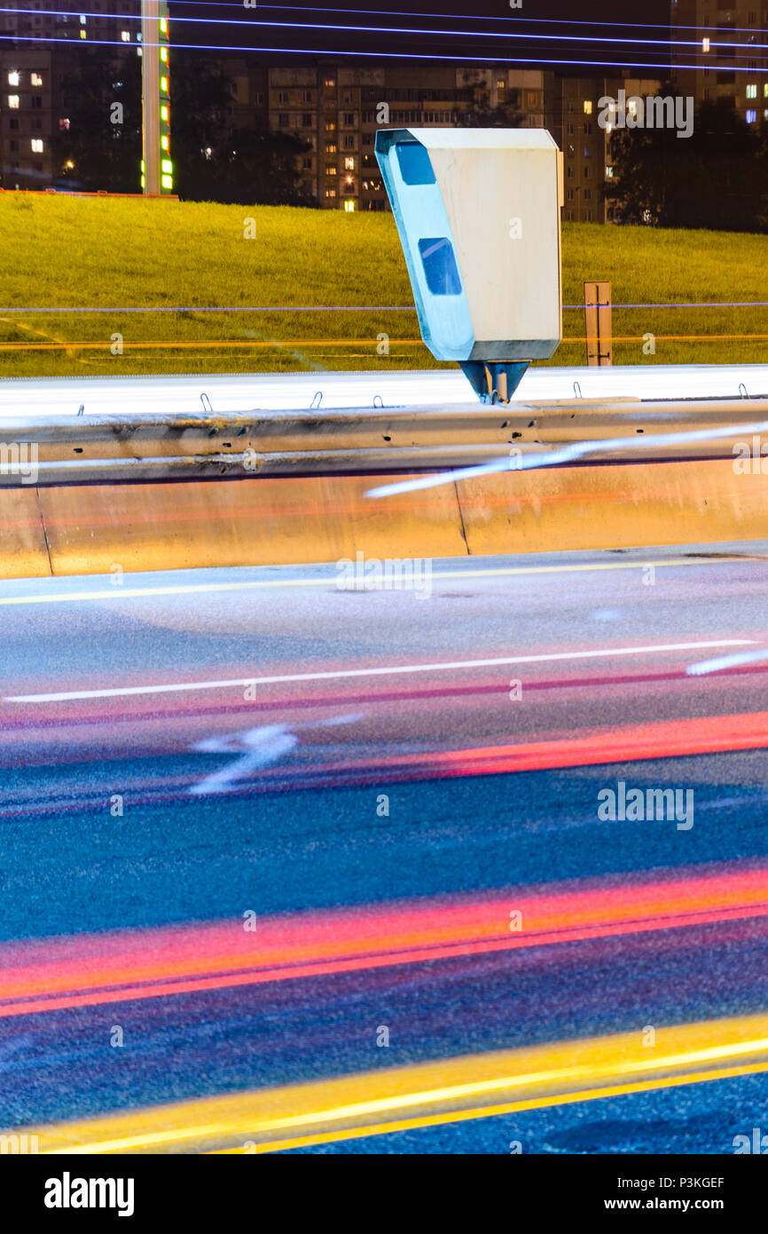 Stationary Car Speed Radar Near a Highway Road. Night Road Traffic ...