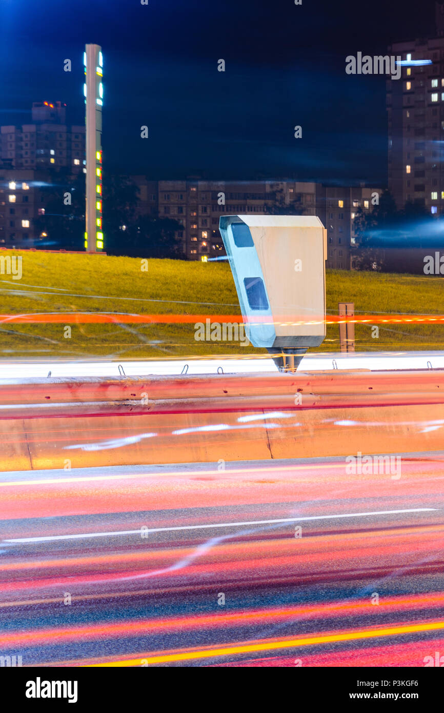 Stationary Car Speed Radar Near a Highway Road. Night Road Traffic ...