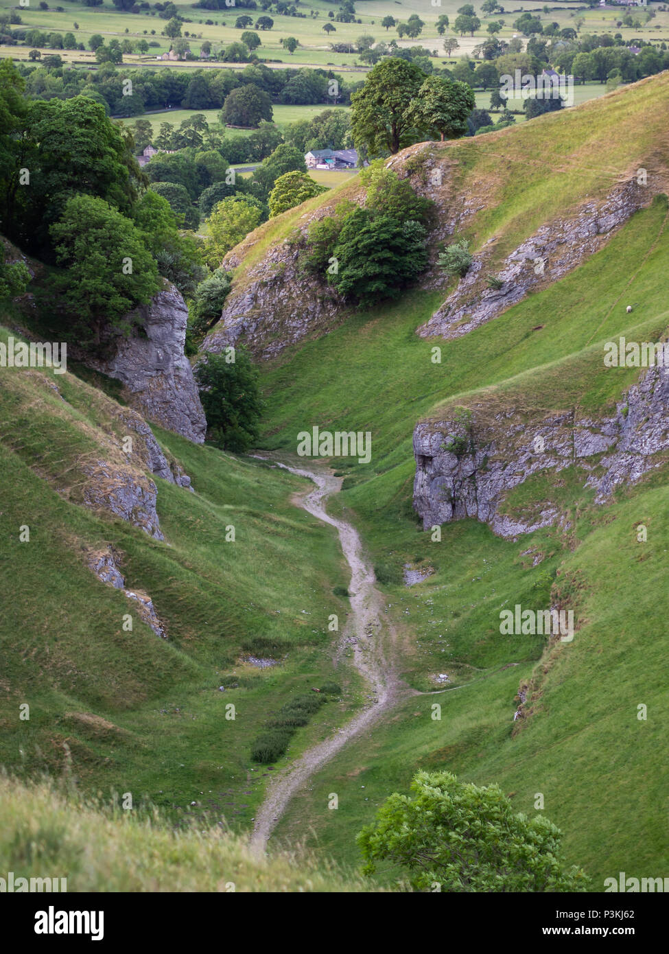 Drainage of cave dale cutting through the rocky landscape of the peak ...