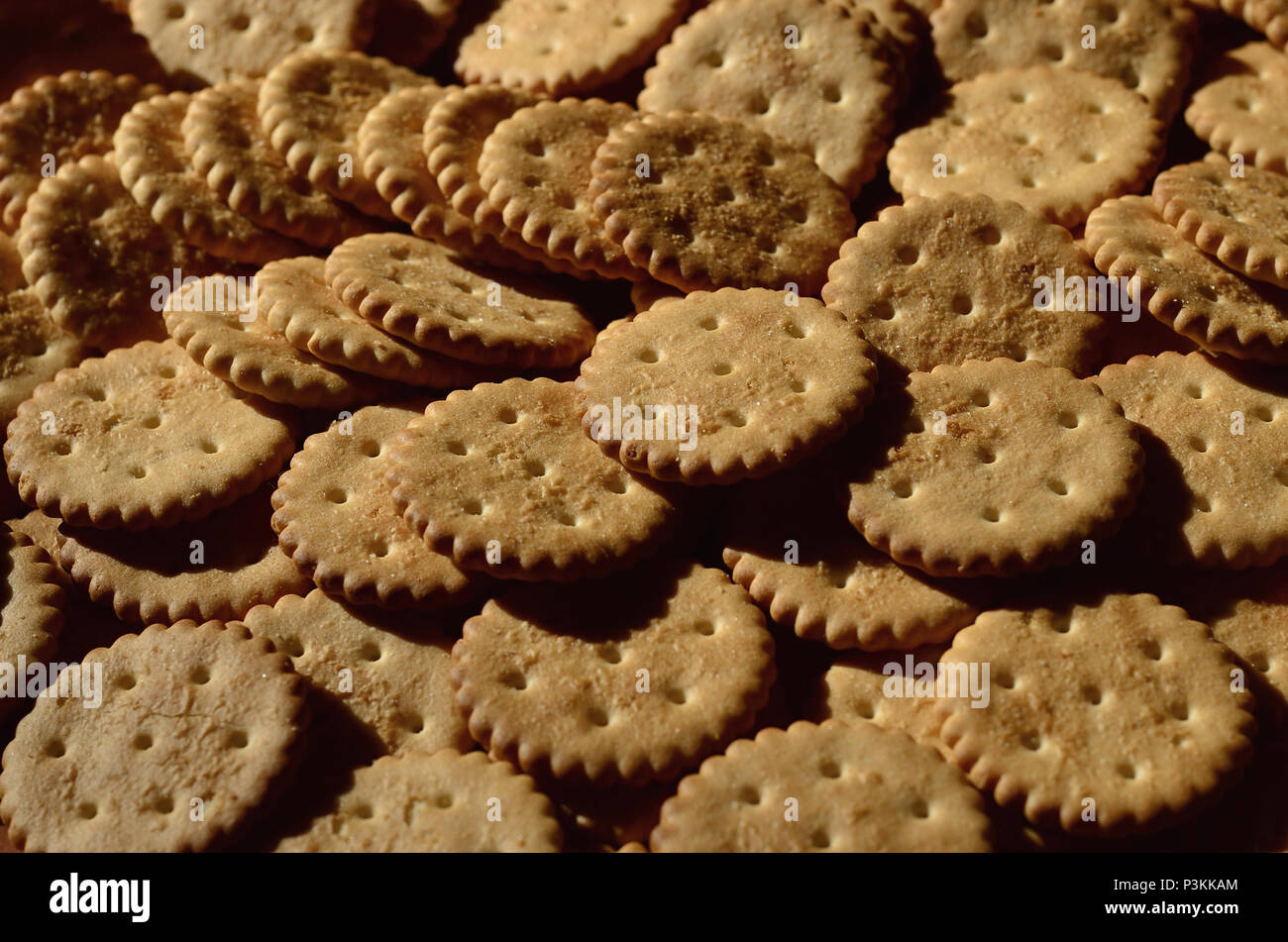Closeup of salted crackers. Background image of classic salty cracker ...