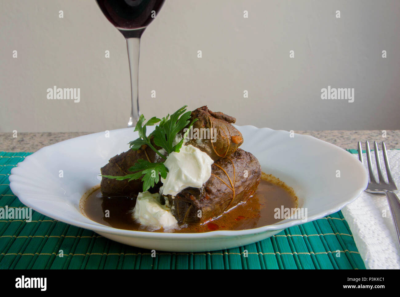Turkish dish dolma (sarma), rice with meat wrapped in grape leaves in ...