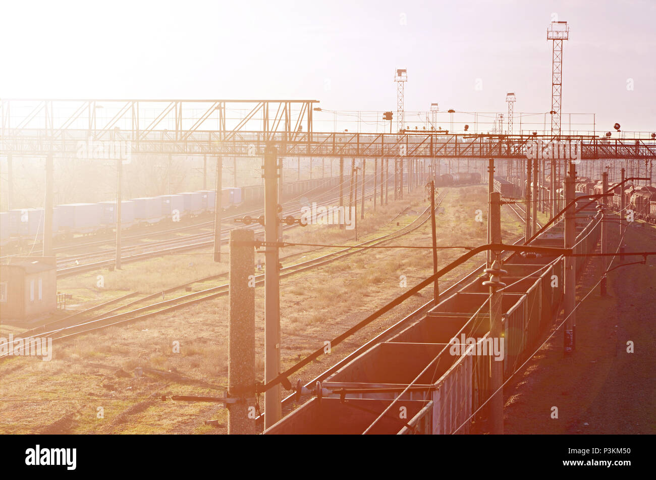 Railway landscape with many old railroad freight cars on the rails ...