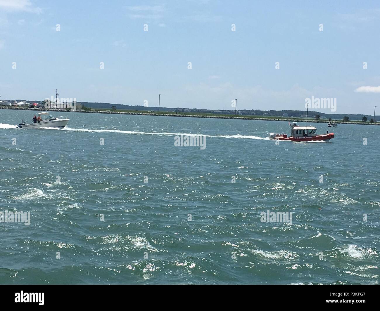 A boat crew from Coast Guard Station Indian River Inlet, De. responds ...