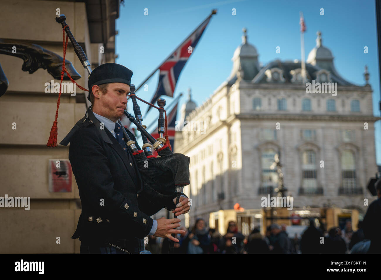 London, UK - November 2017. Scottish bagpipe player performing in ...
