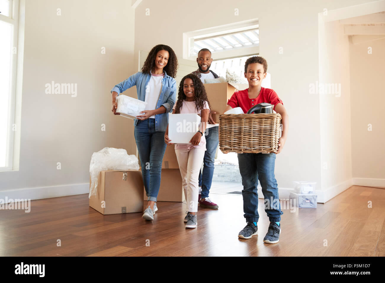 Portrait children unpacking boxes hi-res stock photography and images ...
