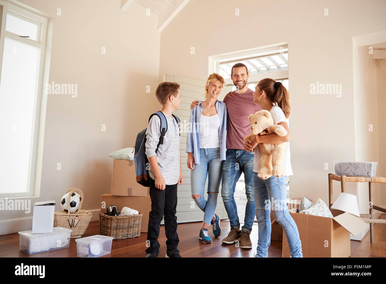 Excited family in lounge hi-res stock photography and images - Alamy