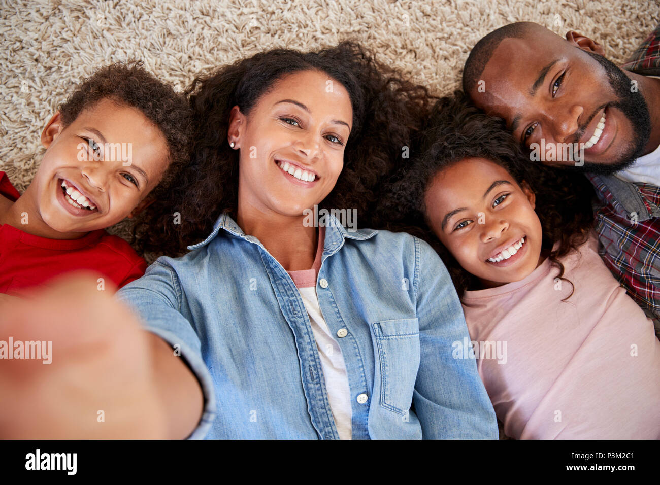 Point Of View Shot Of Parents And Children Posing For Selfie Stock ...