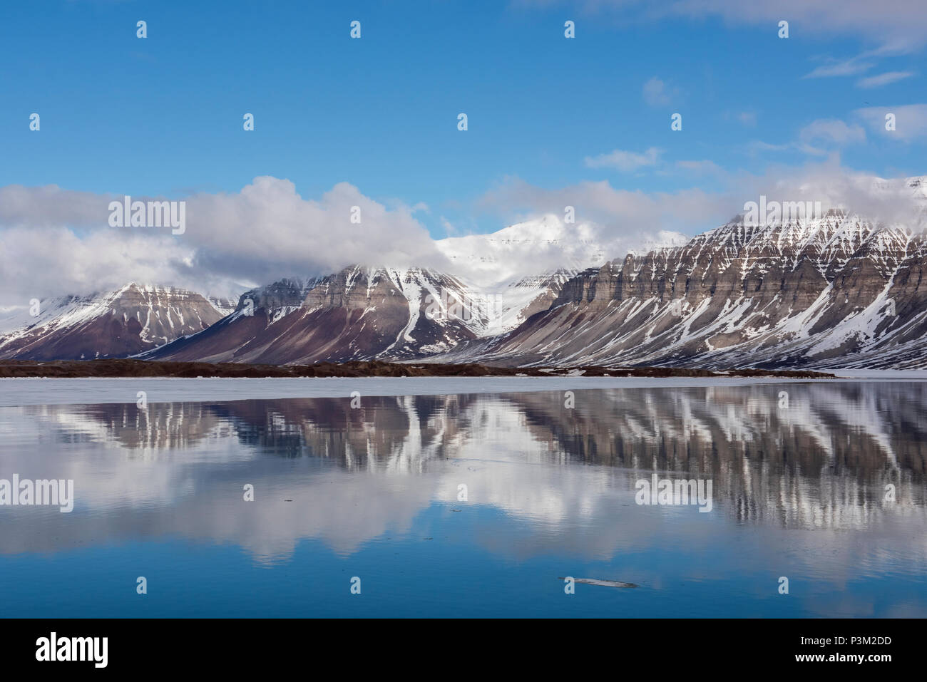 Norway, Svalbard, Spitsbergen, Isfjord. Arctic fjord reflections Stock ...