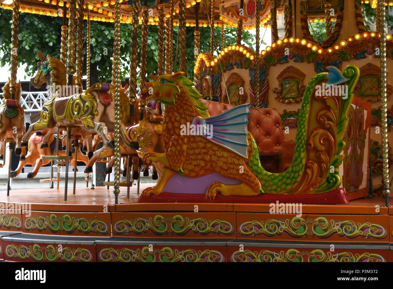 Tradirtionally colourful carousel ride hi-res stock photography and ...