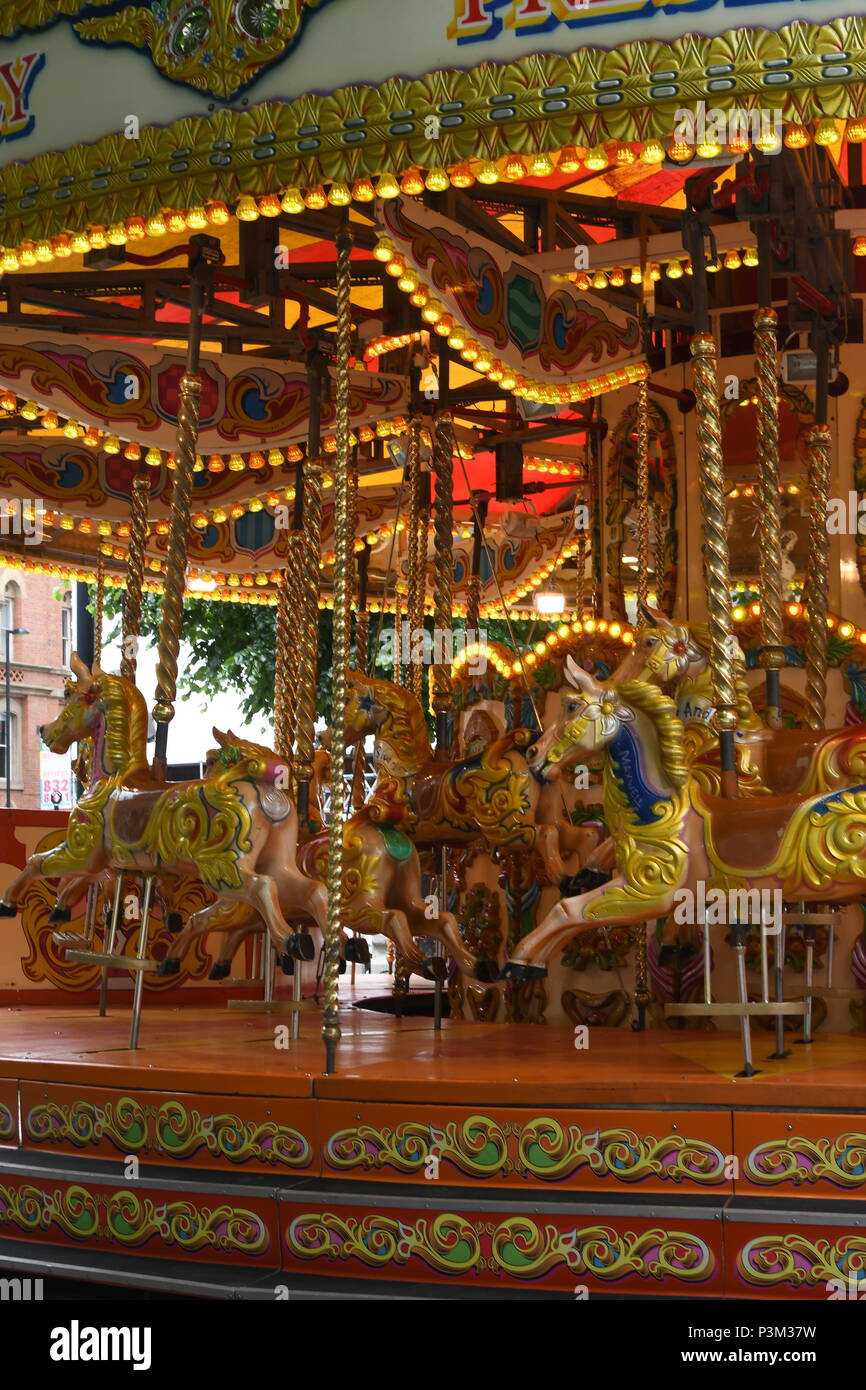 Tradirtionally colourful carousel ride hi-res stock photography and ...