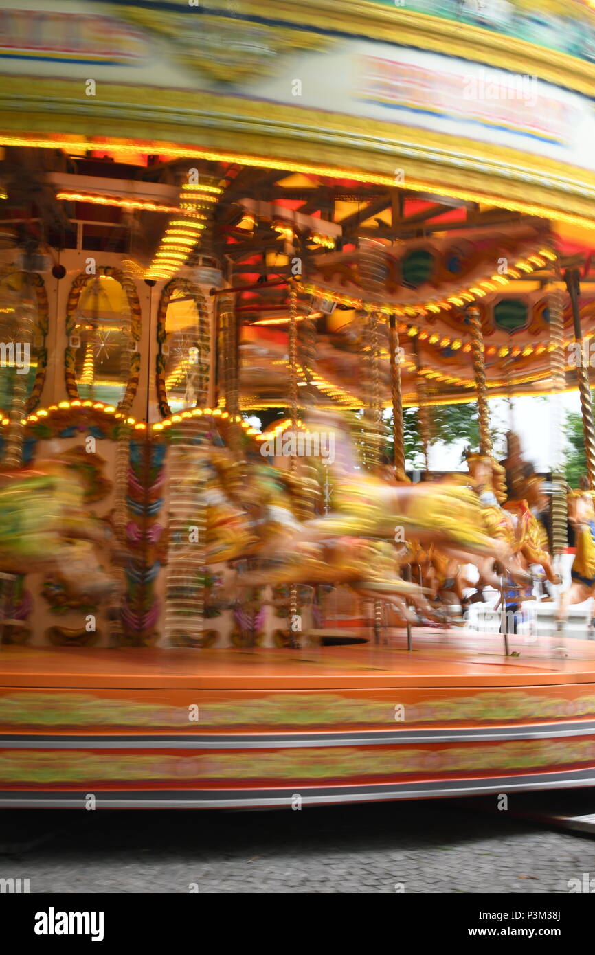 Tradirtionally colourful carousel ride hi-res stock photography and ...