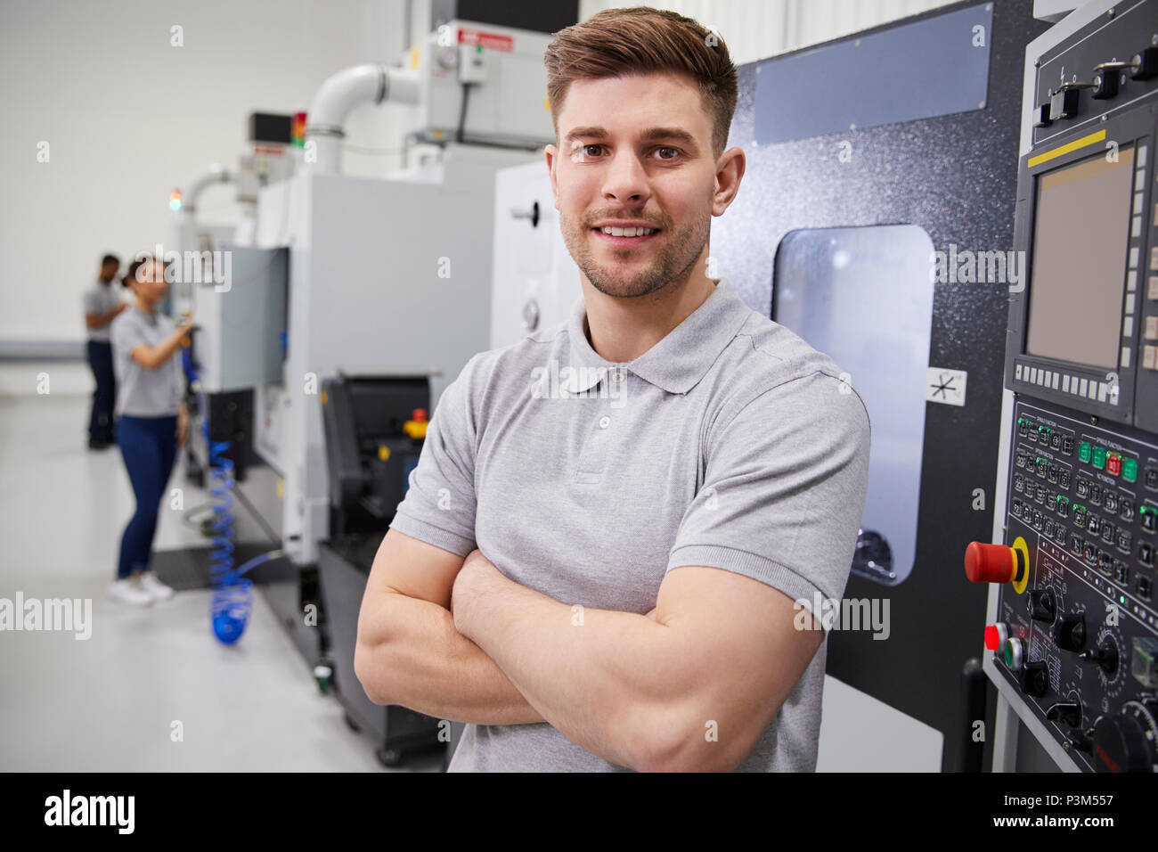 Portrait male engineer operating cnc hi-res stock photography and ...
