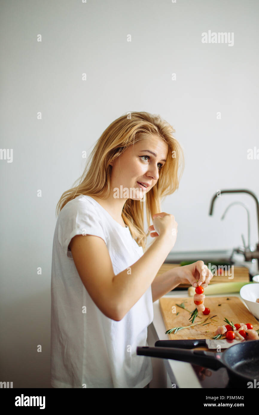 Closeup woman roasting kebabs hi-res stock photography and images - Alamy