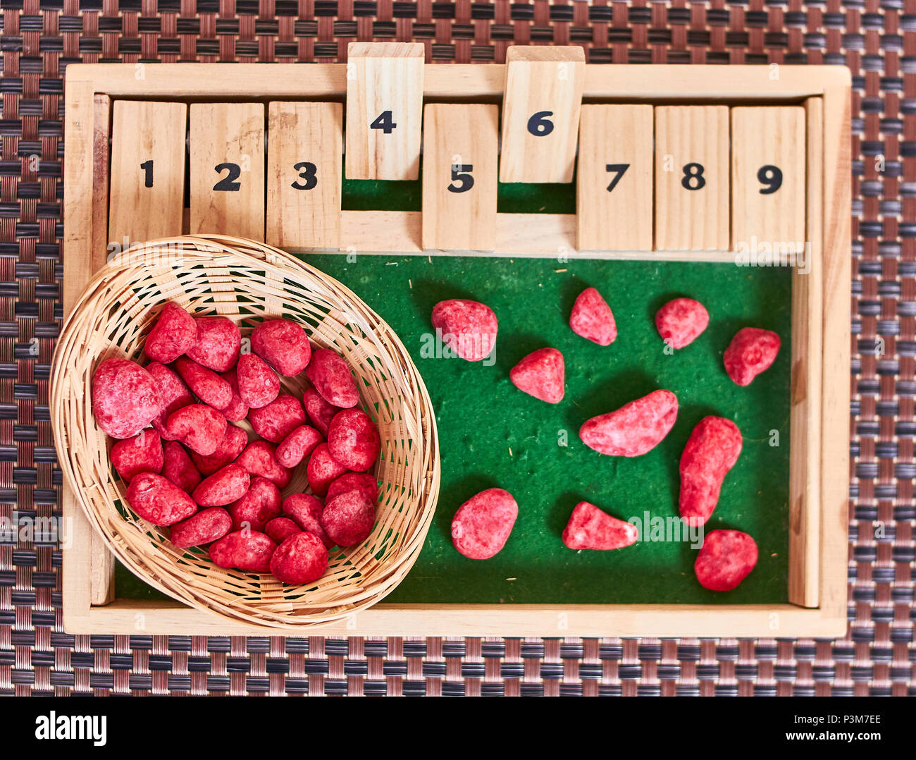 Montessori abacus for counting with wood and pebbles Stock Photo - Alamy