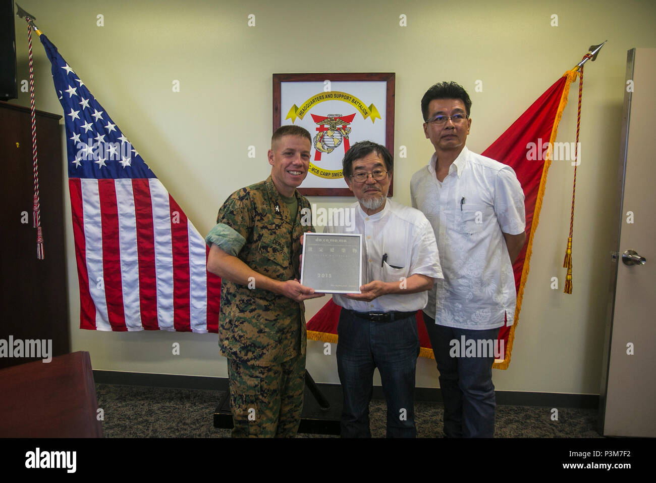 Col. William L. Depue poses with members of the Japan Institute of ...