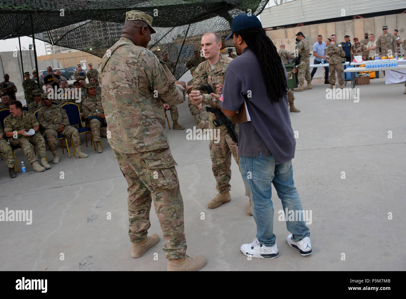 Master Sgt. Fredrick Murphy, left, Combined Joint Forces Land Component ...