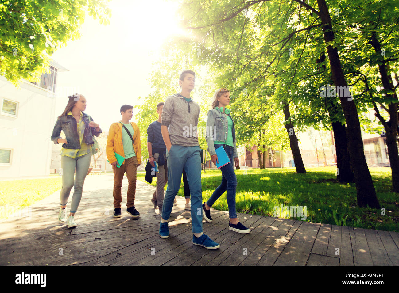 Students boy girl walking campus hi-res stock photography and images ...