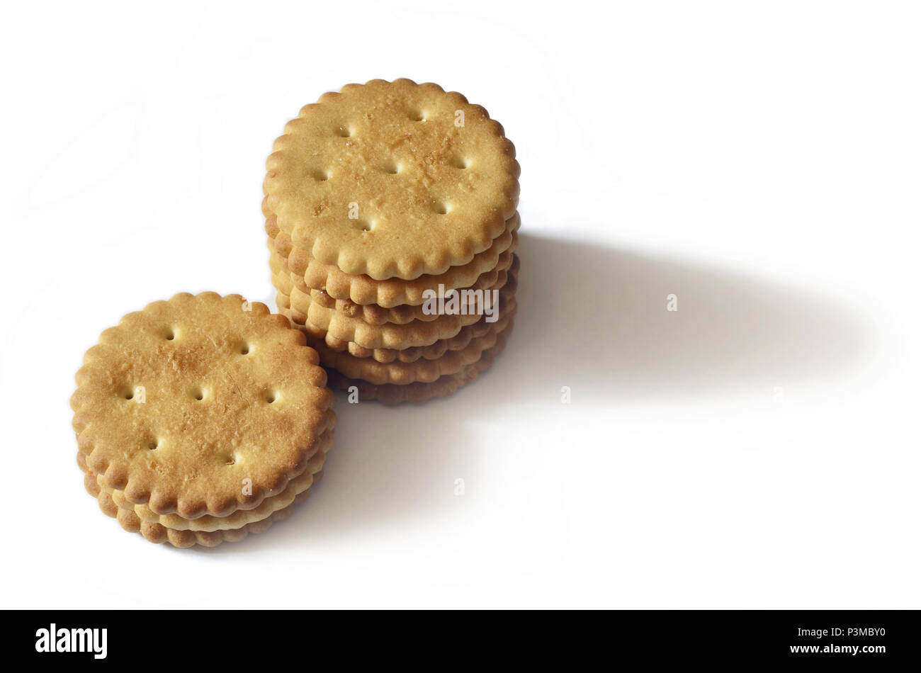 Classic round golden yellow salted cracker isolated on over white ...