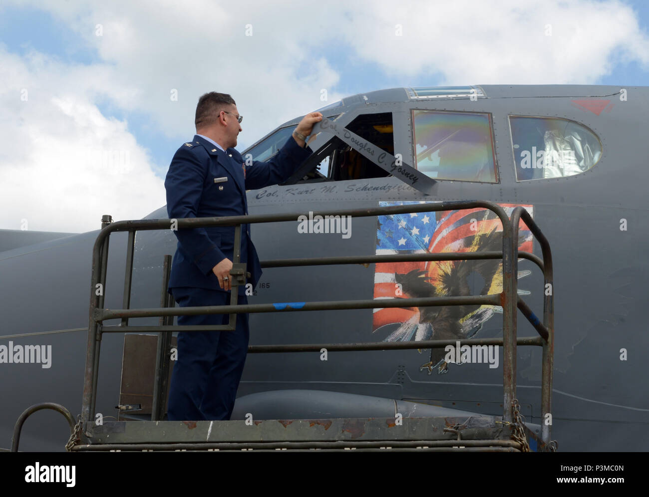Col. Kurt Schendzielos, 2nd Operations Group commander, removes the ...