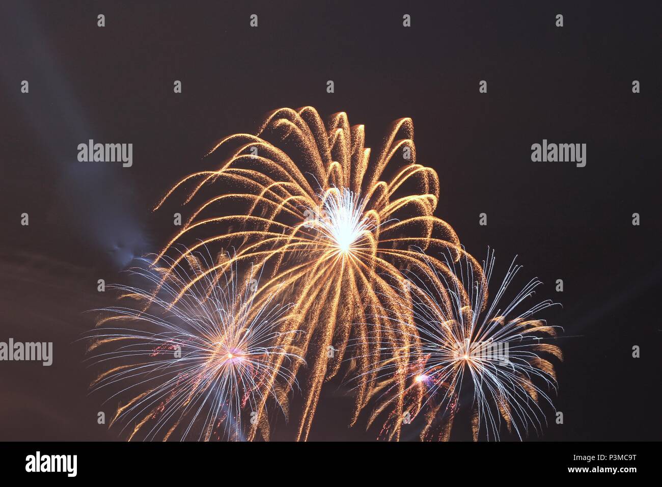 Summer fireworks over a lake Stock Photo - Alamy