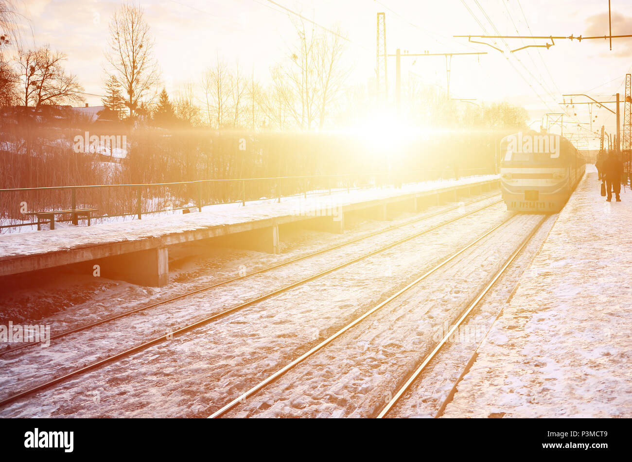 Photo of bright and beautiful sunset on a cloudy sky in cold winter ...