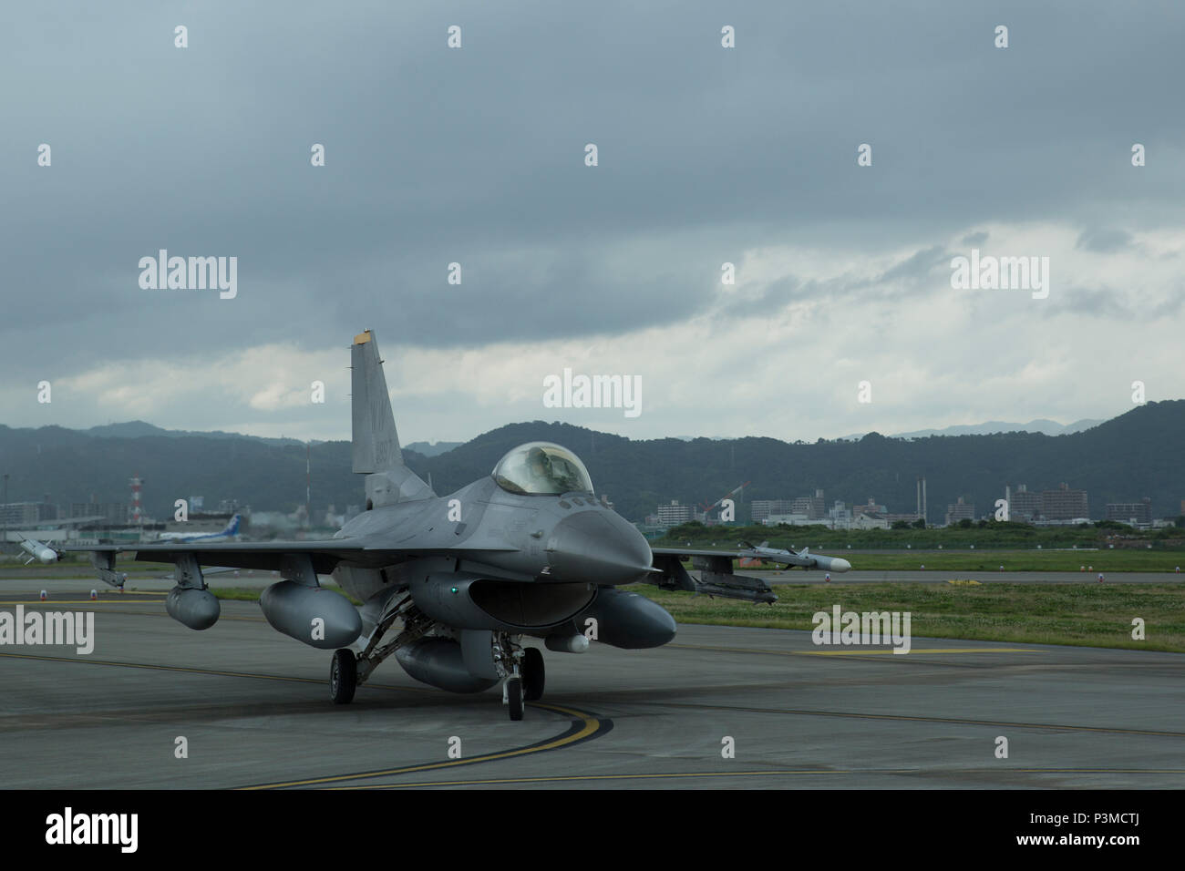 A U.S. Air Force F-16 fighter jet from Misawa Air Base, Japan, taxis to ...