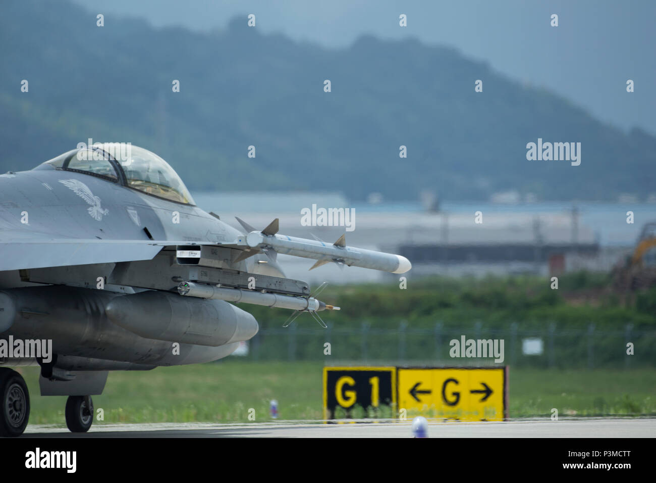 A U.S. Air Force F-16 fighter jet from Misawa Air Base, Japan, taxis to ...