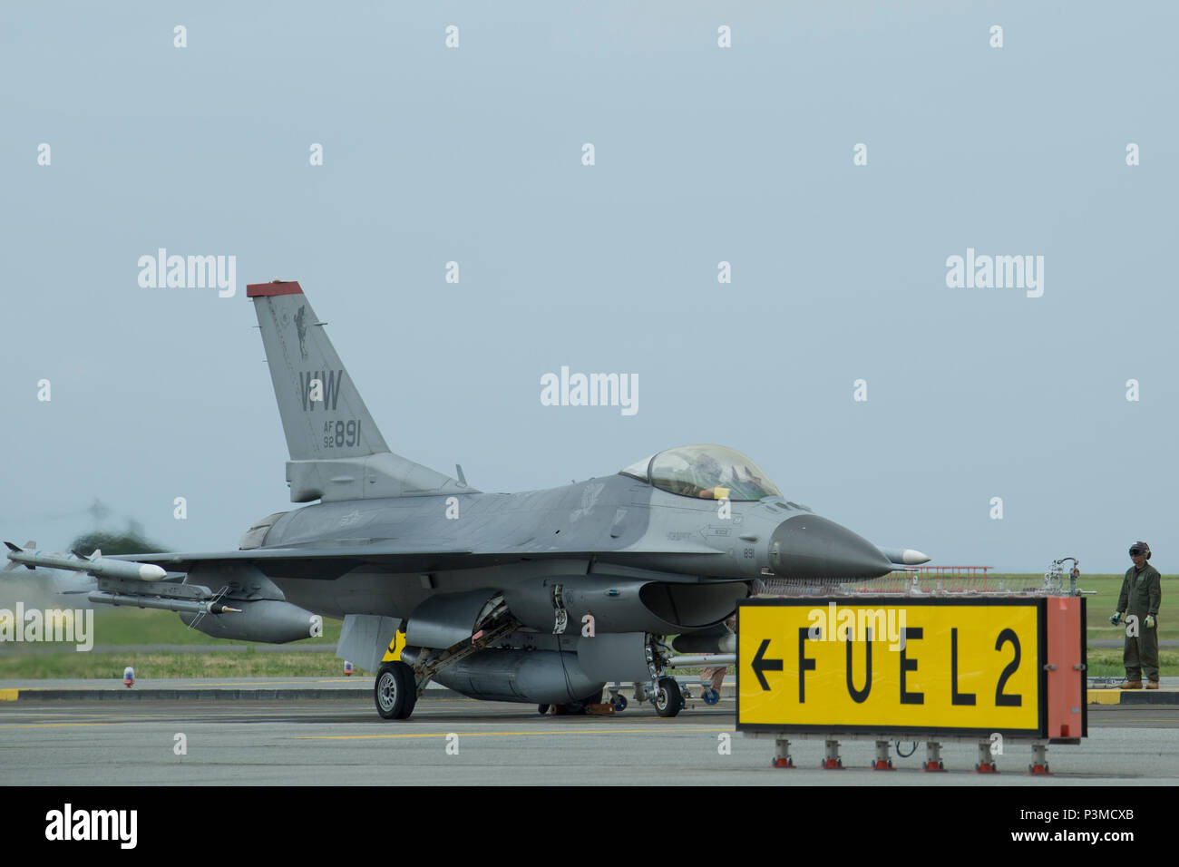 A U.S. Air Force F-16 fighter jet from Misawa Air Base, Japan, refuels ...