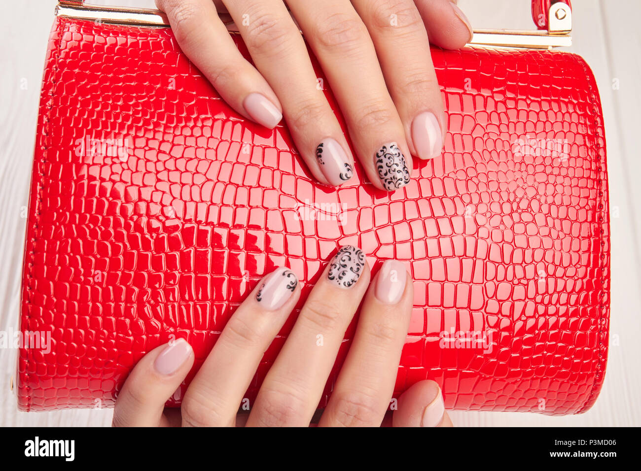 Handbag in hand hi-res stock photography and images - Alamy