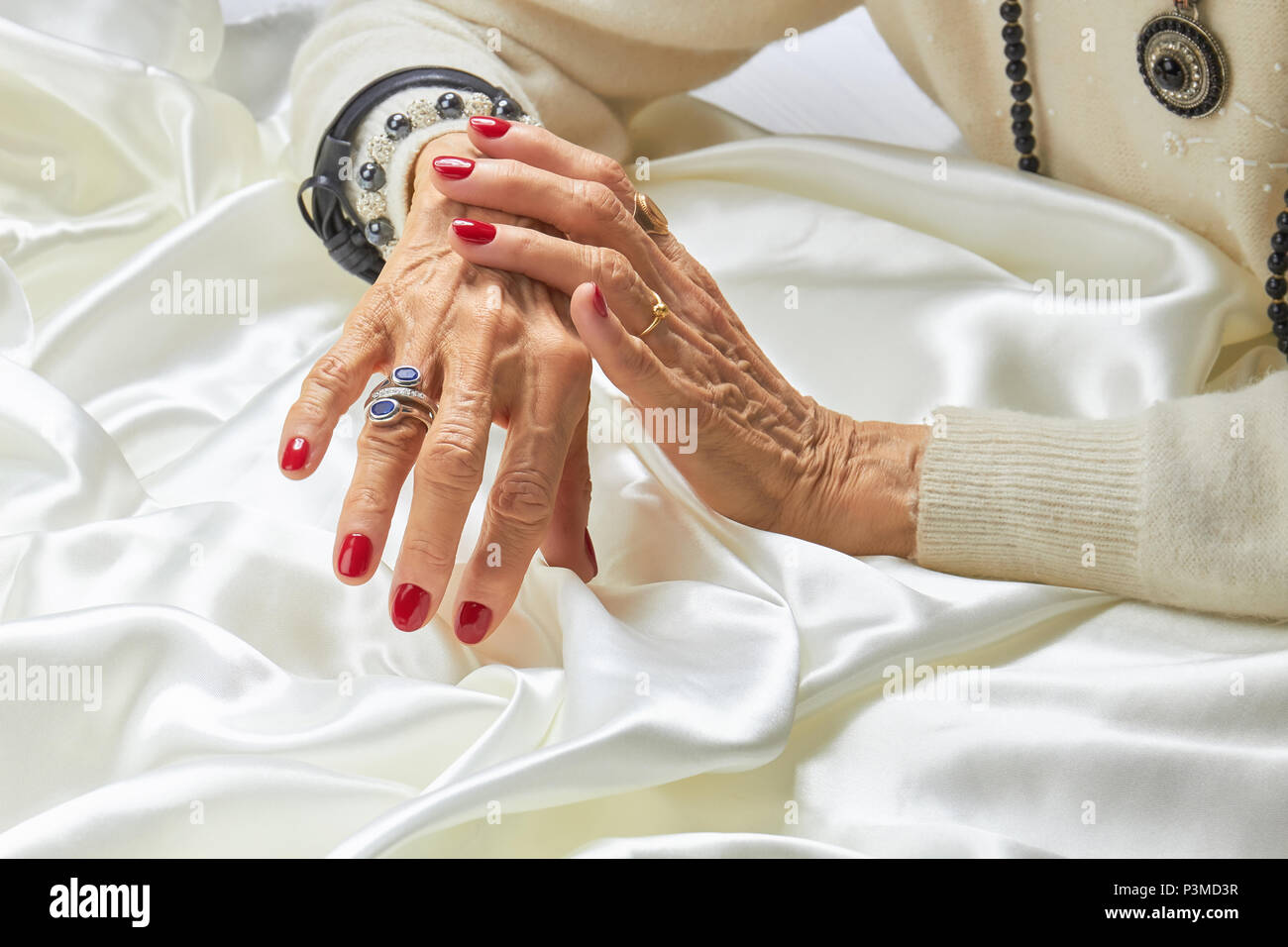 Old woman luxury hands with manicure Stock Photo - Alamy