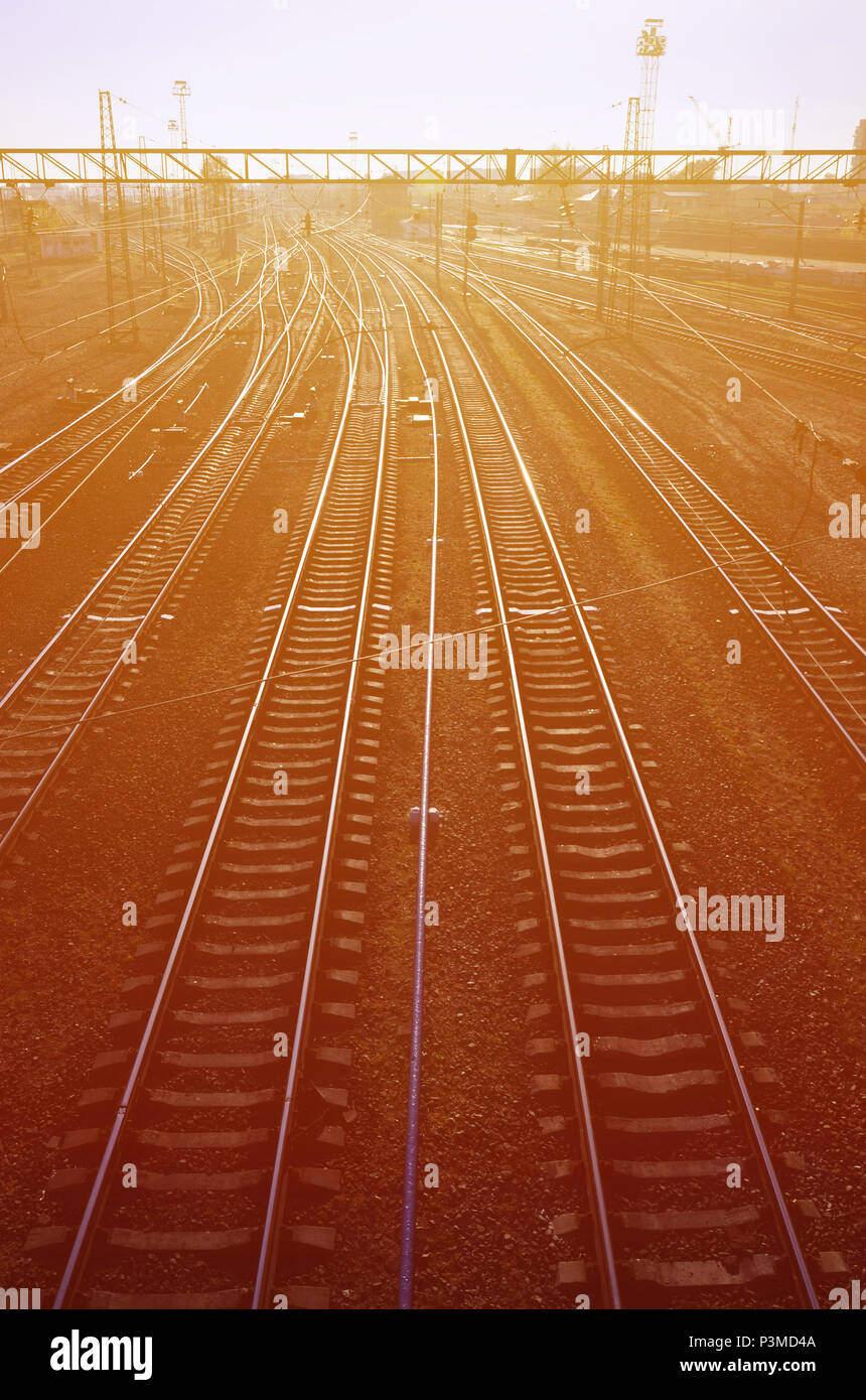 Railway landscape. Empty railway tracks in depot under the open air ...