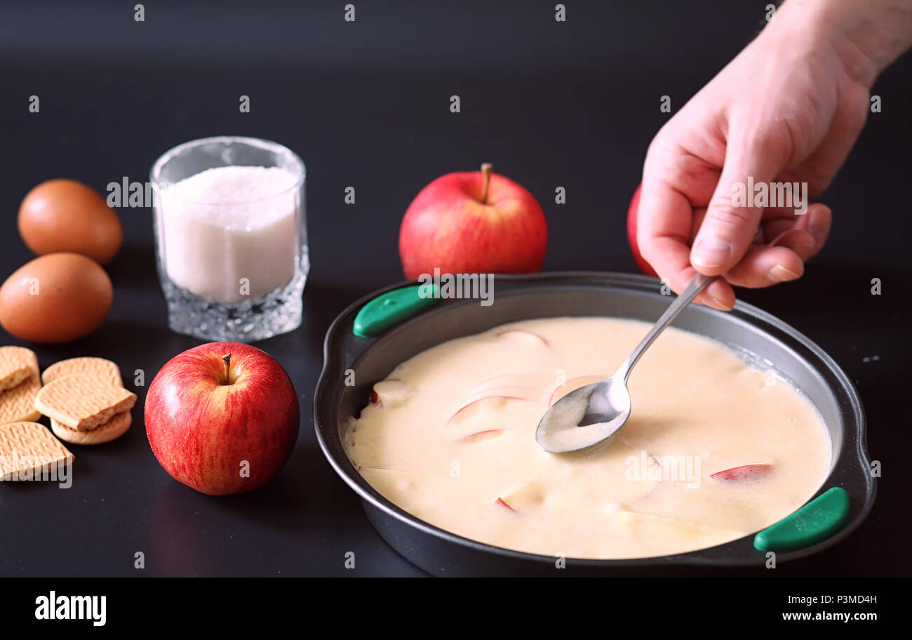 Preparation of apple pie at home. Homemade pastries with apples and ...