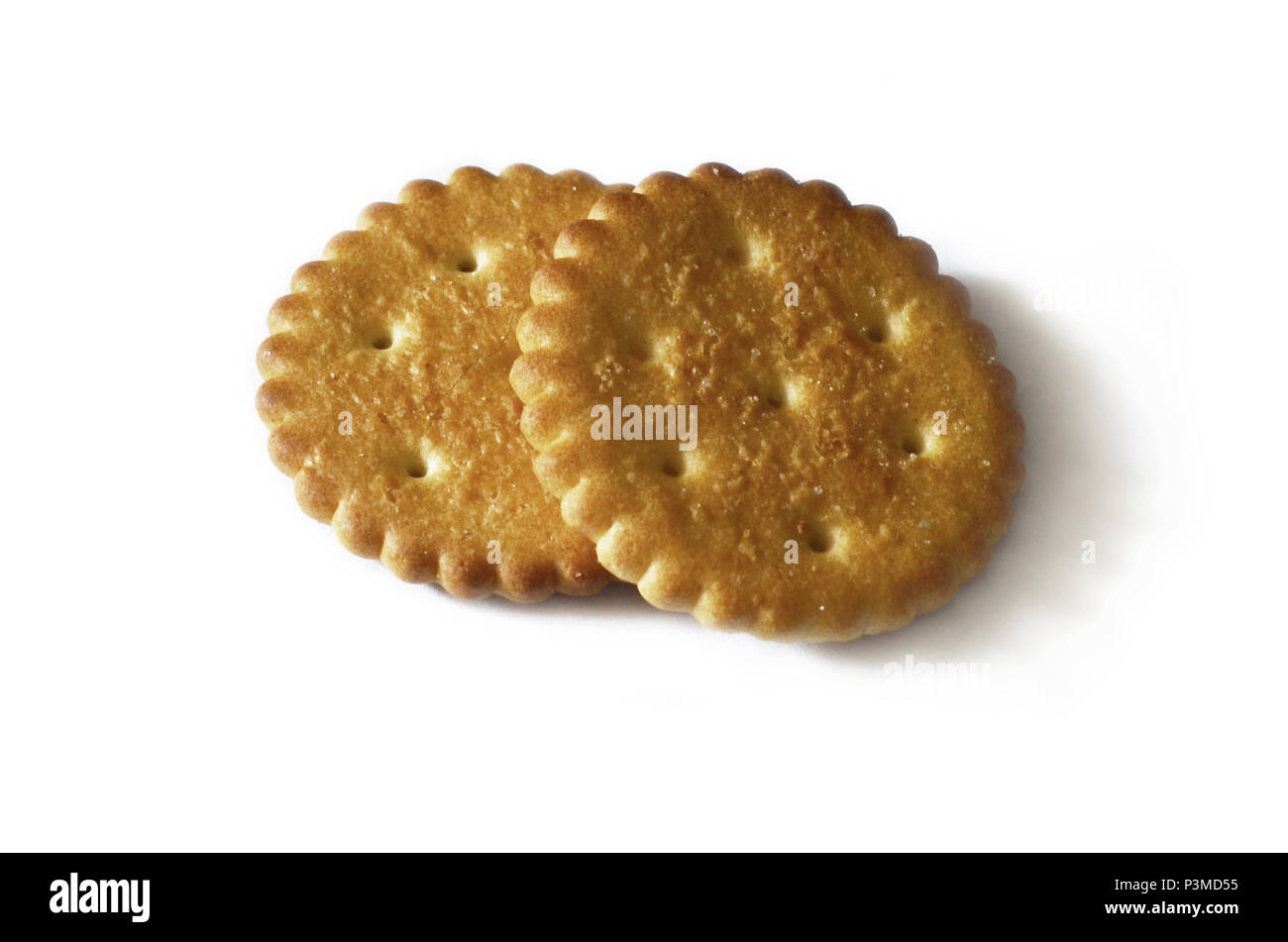 Classic round golden yellow salted cracker isolated on over white ...