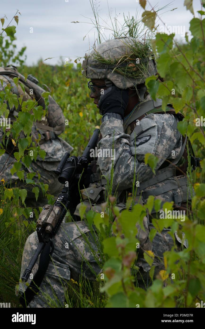A U.S. Army West Point cadet uses radio communications, while ...