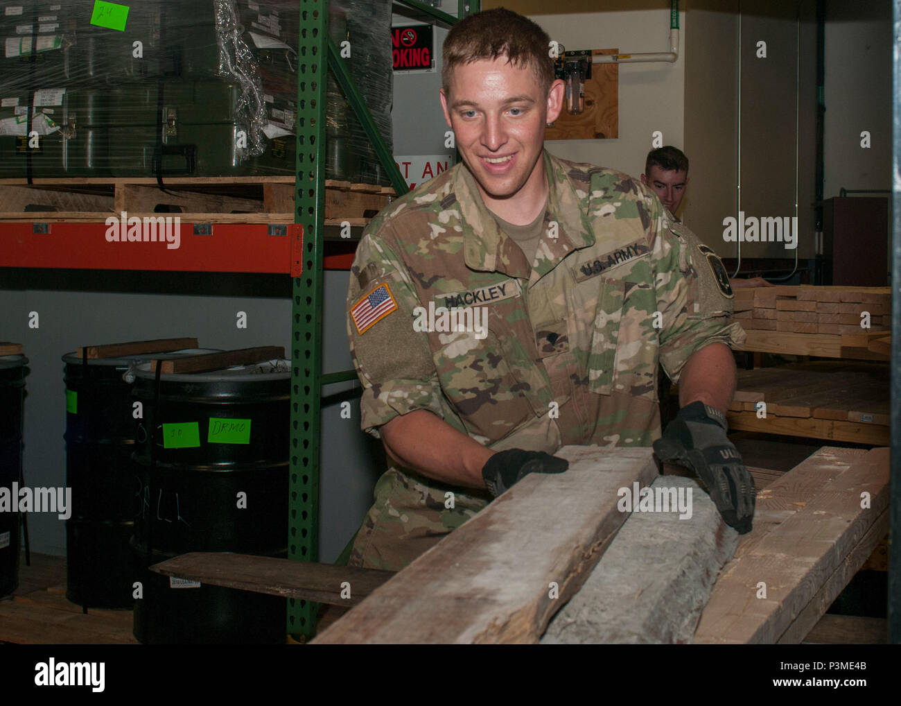 U.S. Army Spc. John Hackley, a material handler with Delta Company ...