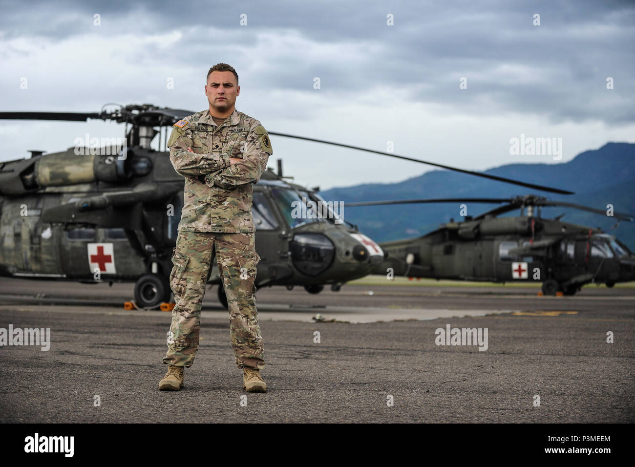 U.S. Army Spc. Tyler Holman, a combat medic assigned to the 1st ...