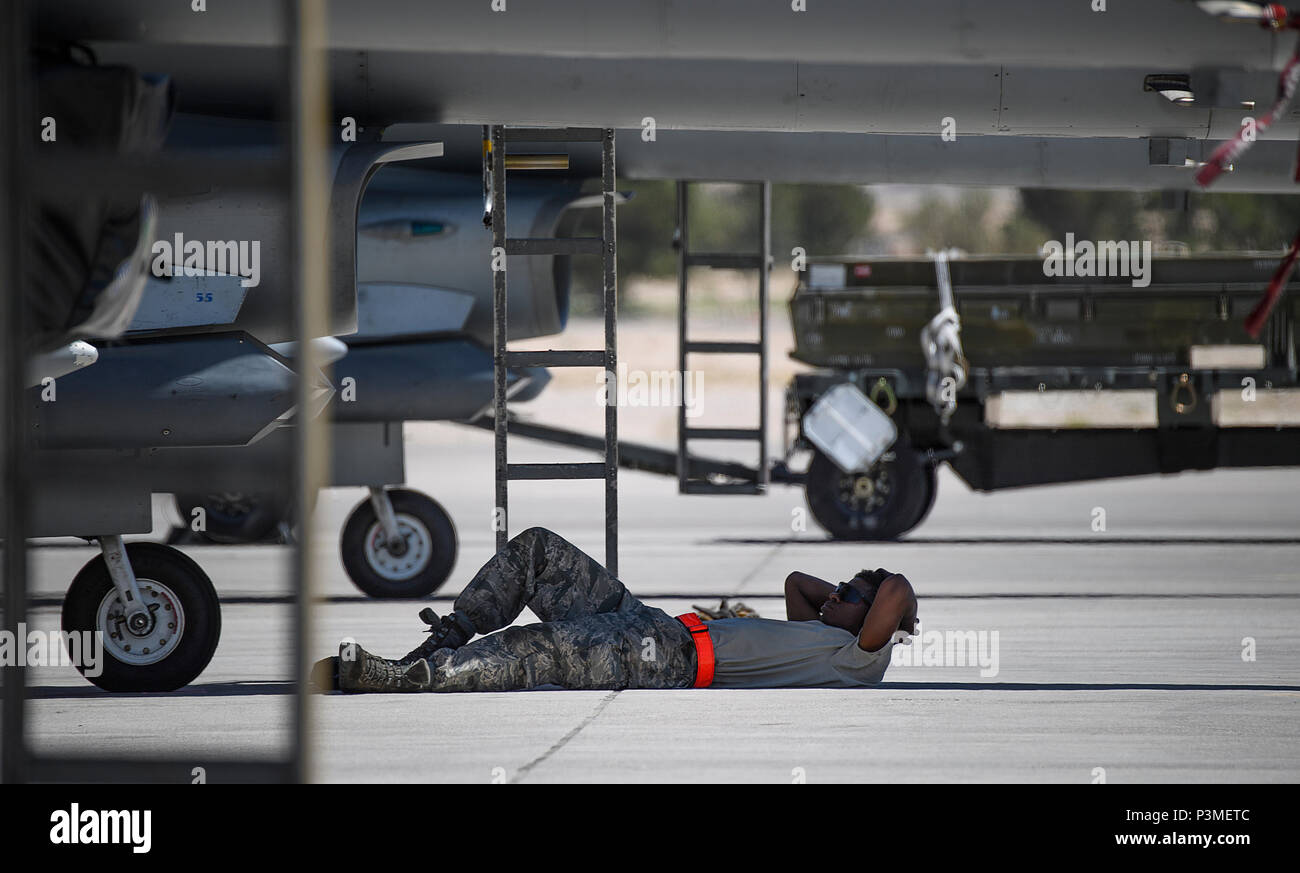 As temperatures approach 100 degrees, Airman 1st Class Darius Moss from ...