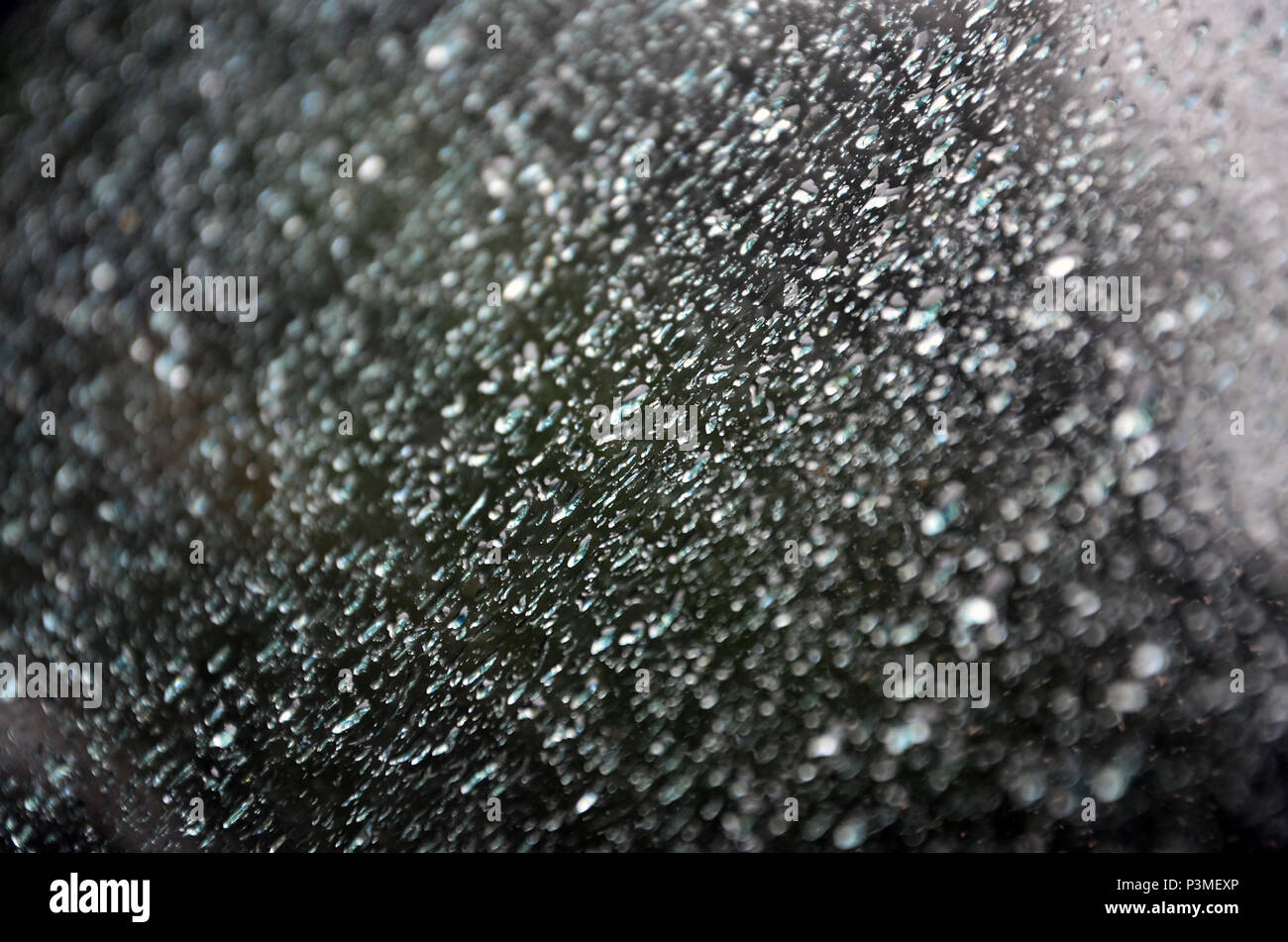 Background image of rain drops on a glass window. Macro photo with ...